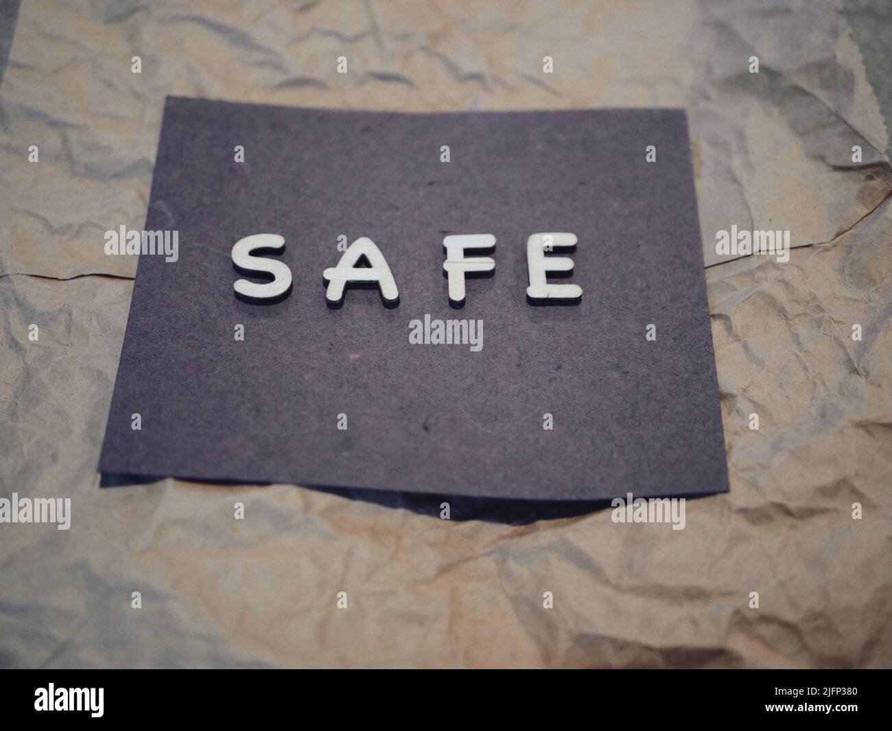 Safe in wooden lettering. Perfect to illustrate safety, cybersecurity ...