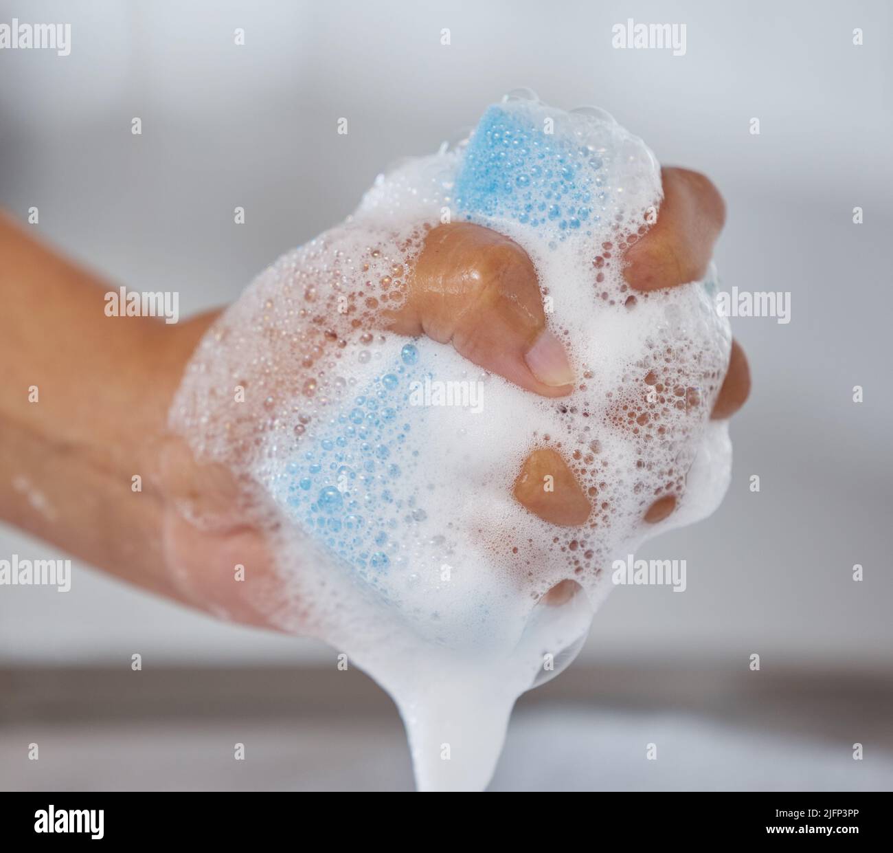 Ready to wash through dirt and grime with a soapy sponge. Closeup shot ...