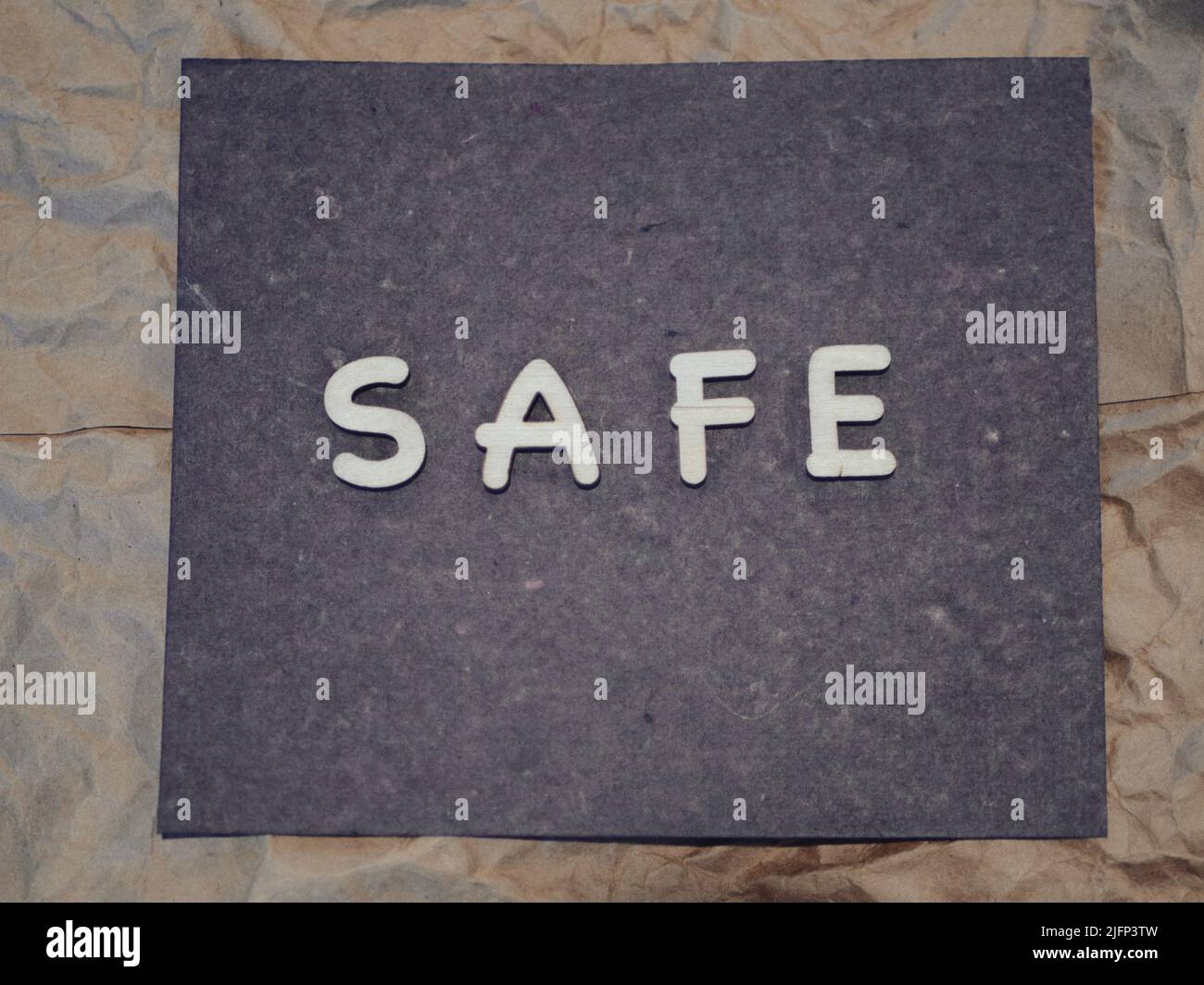 Safe in wooden lettering. Perfect to illustrate safety, cybersecurity ...