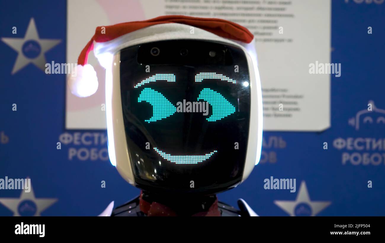 Moving robot face. HDR. Moving eyes of living robot with electronic ...