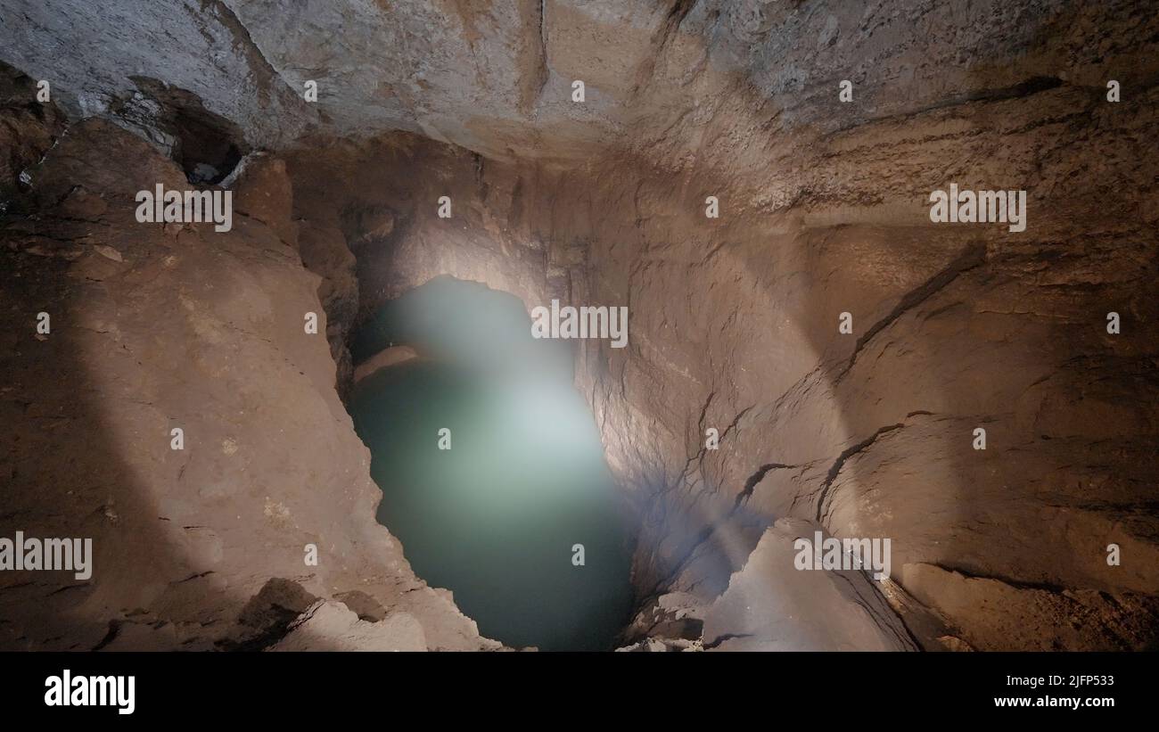 White cave stones.Tourist place. Action. A white stone cave that ...