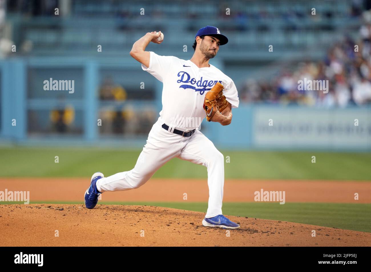 Los Angeles Dodgers starting pitcher Mitch White (66) delivers a pitch ...