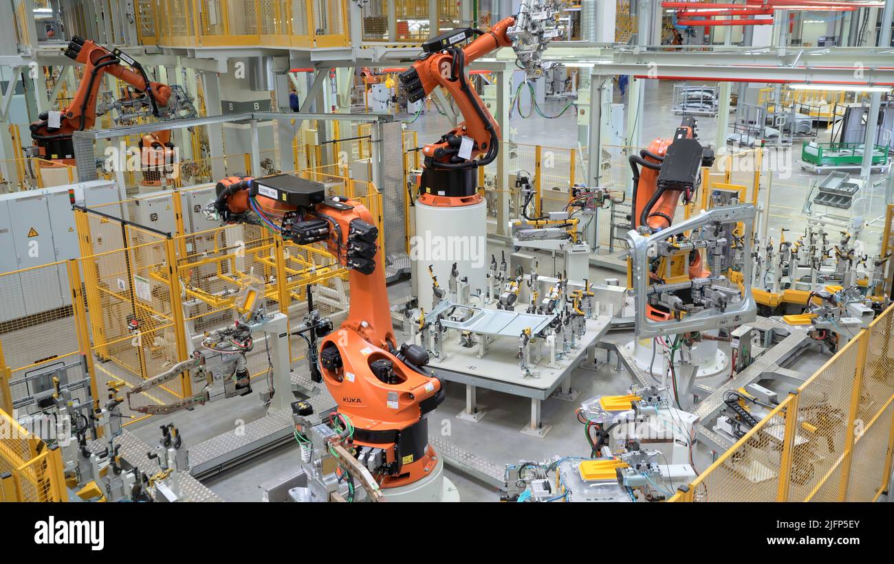 Robots painting car body automated hi-res stock photography and images ...