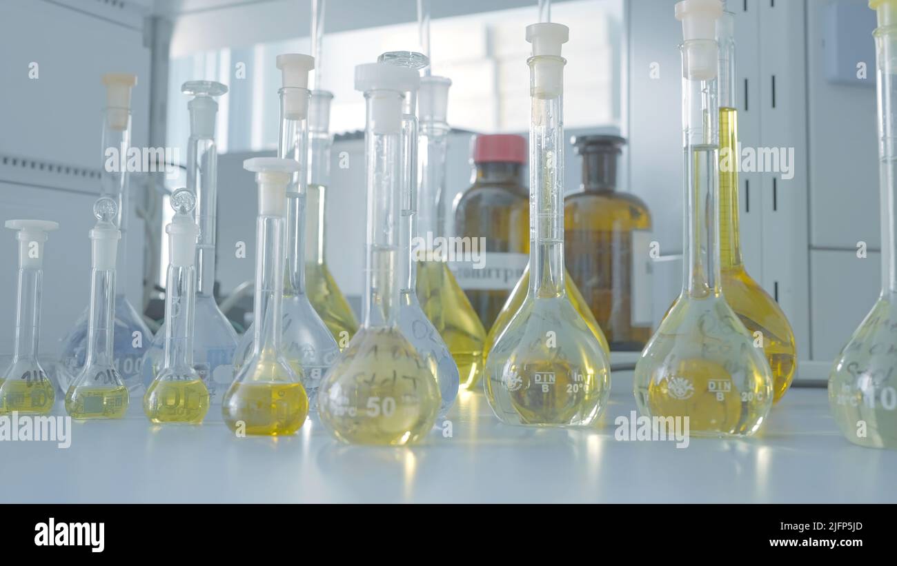 Laboratory test tubes for analysis. Action. Laboratory flasks and test ...