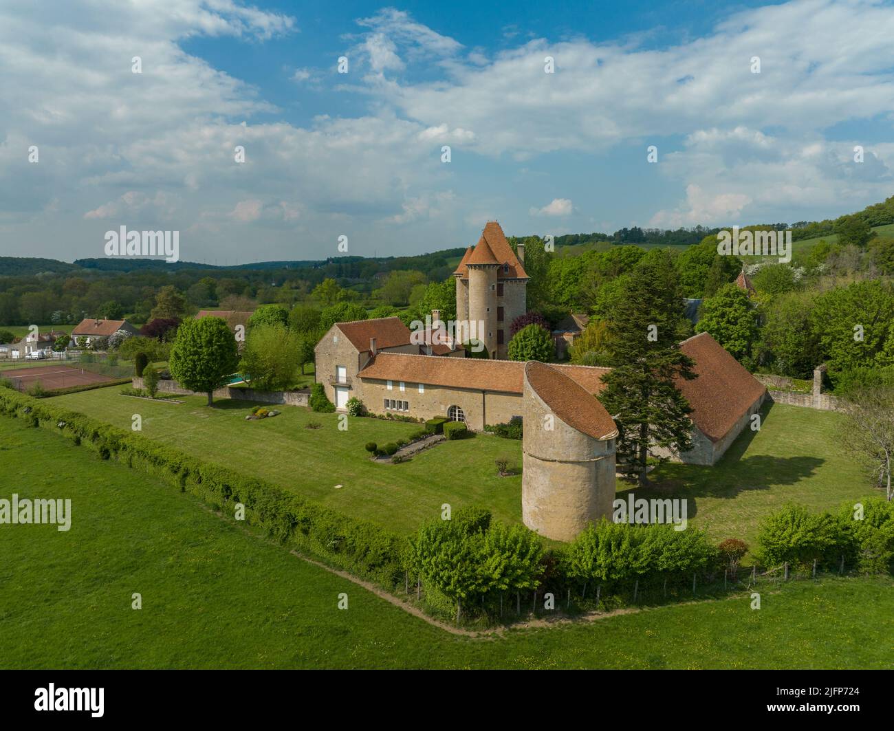 Aerial view of rural medieval castle with towers in Angely Pancy France ...