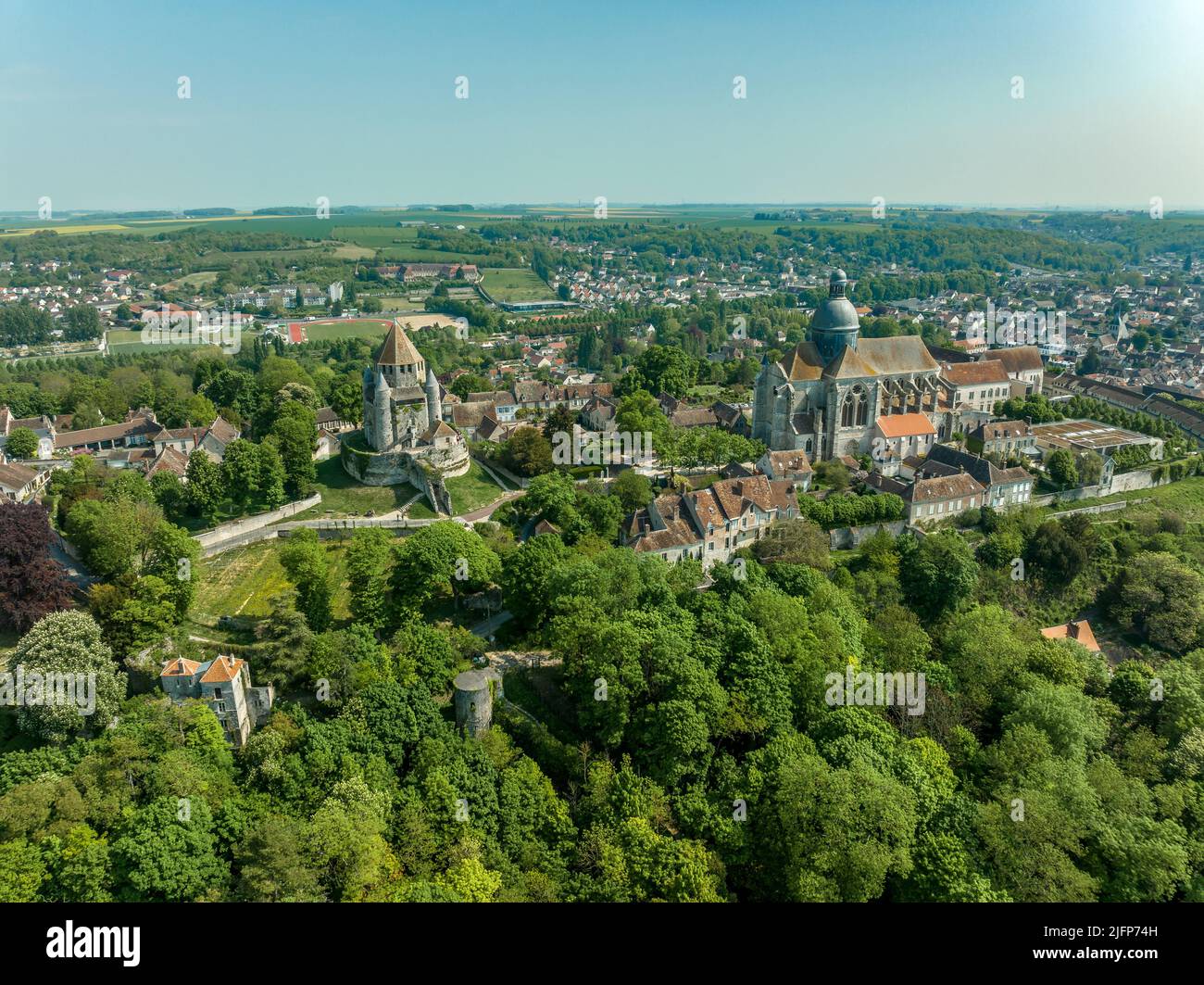 Stone ramparts with towers, gate towers, moat in medieval Provins ...