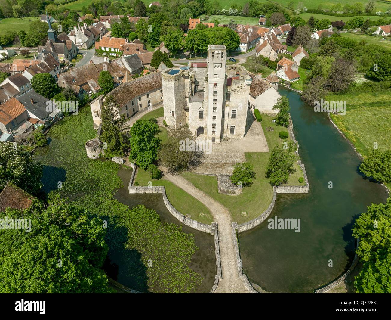 Aerial view of Sagonne castle in France with inner complex surrounded ...