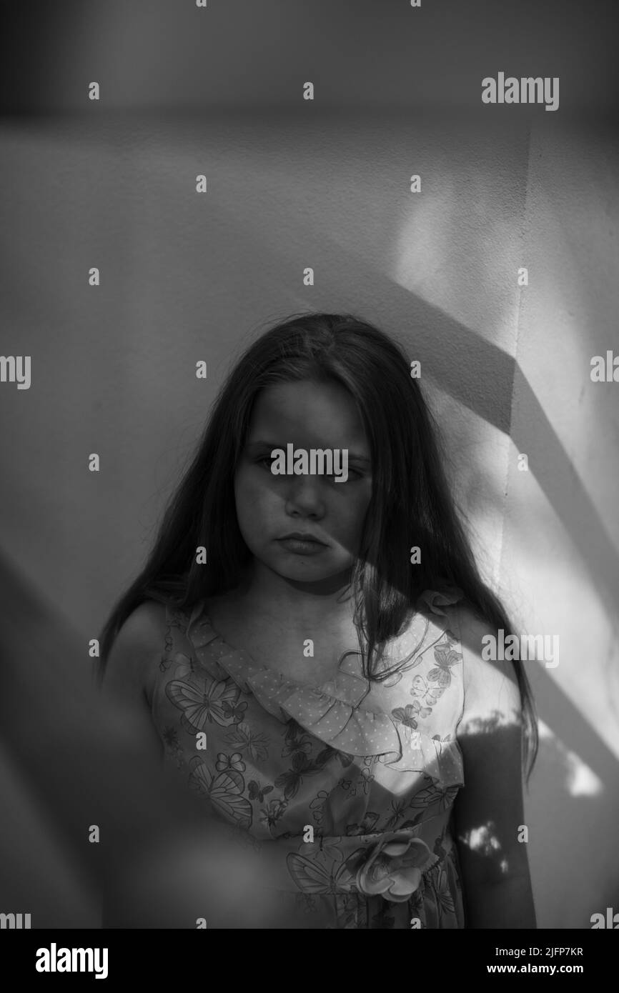 Shadow girl on an orange wall in summer Stock Photo - Alamy