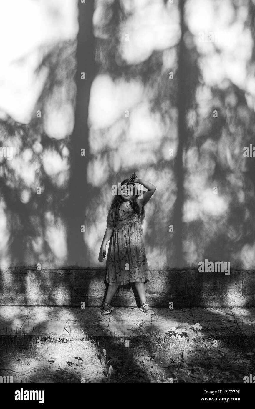 Shadow girl on an orange wall in summer Stock Photo - Alamy