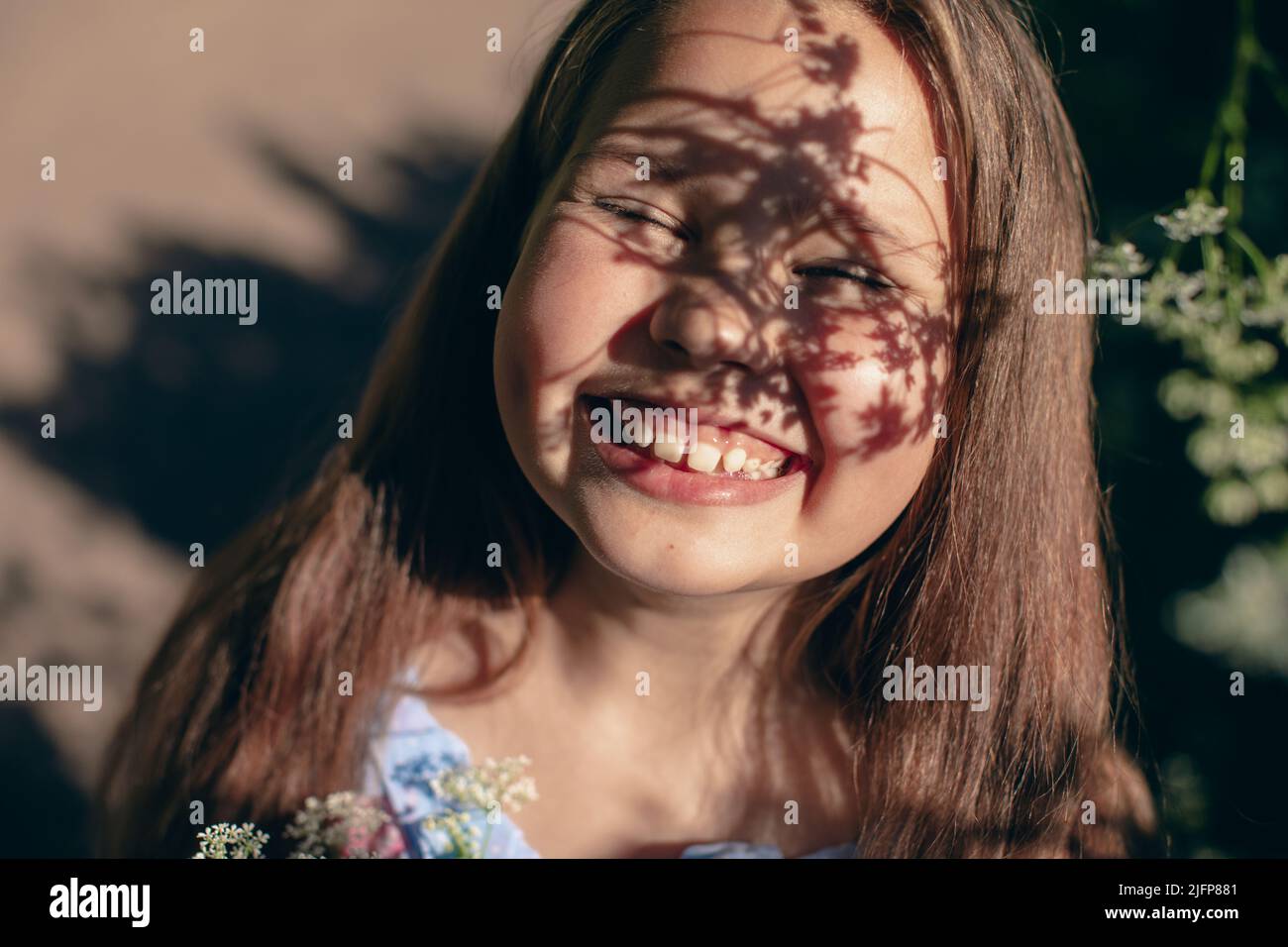 Shadow girl on an orange wall in summer Stock Photo - Alamy