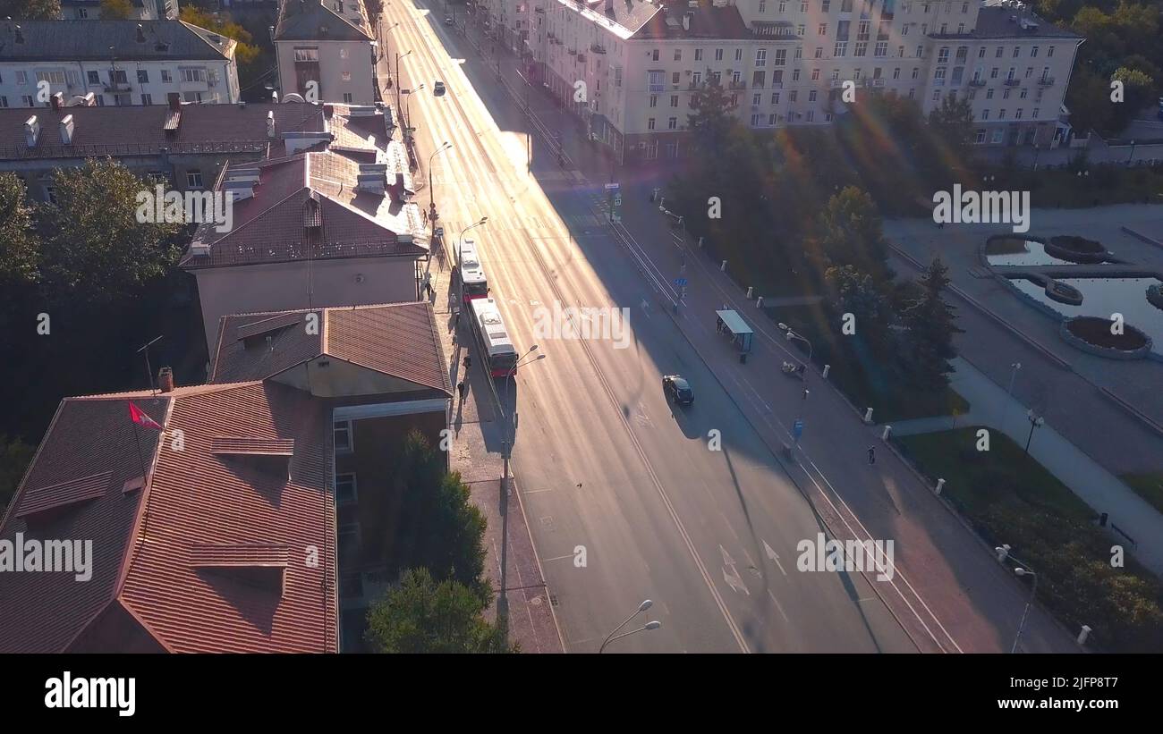Top view of beautiful city road with car on sunny day. Clip. Urban ...