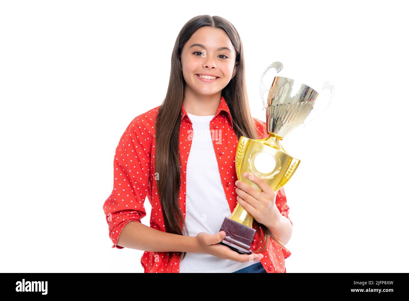 Teenage girl holding a trophy. Kid winner child won the competition ...
