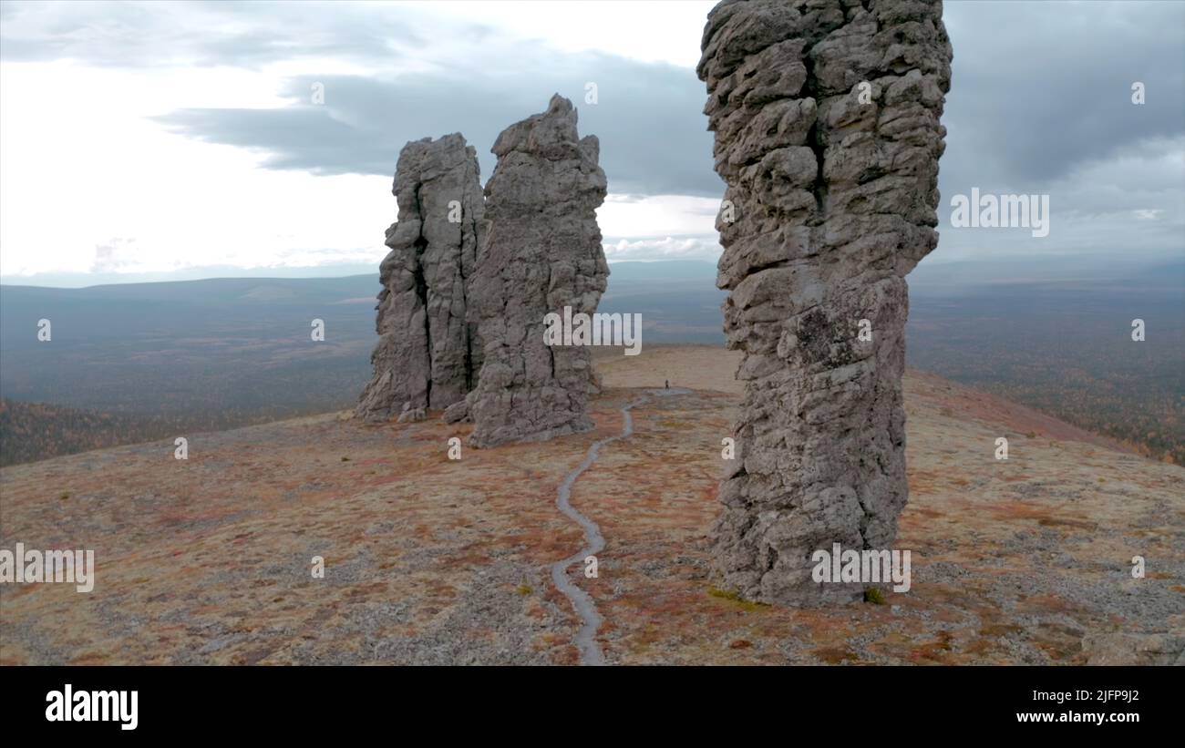Top view of stone pillars on mountain. Clip. Natural stone pillars on ...
