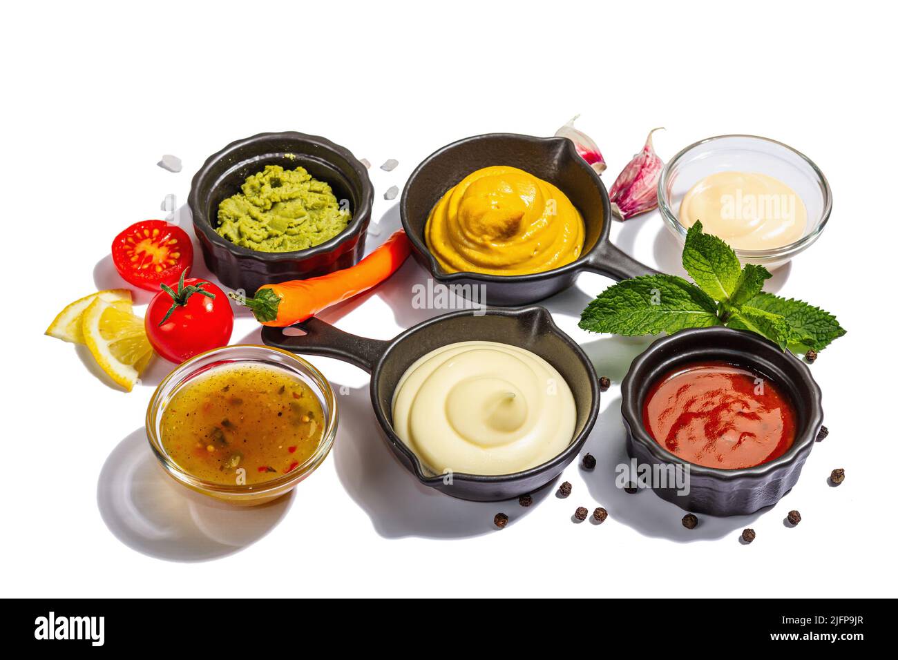 Set of sauces and fresh vegetables isolated on white background ...