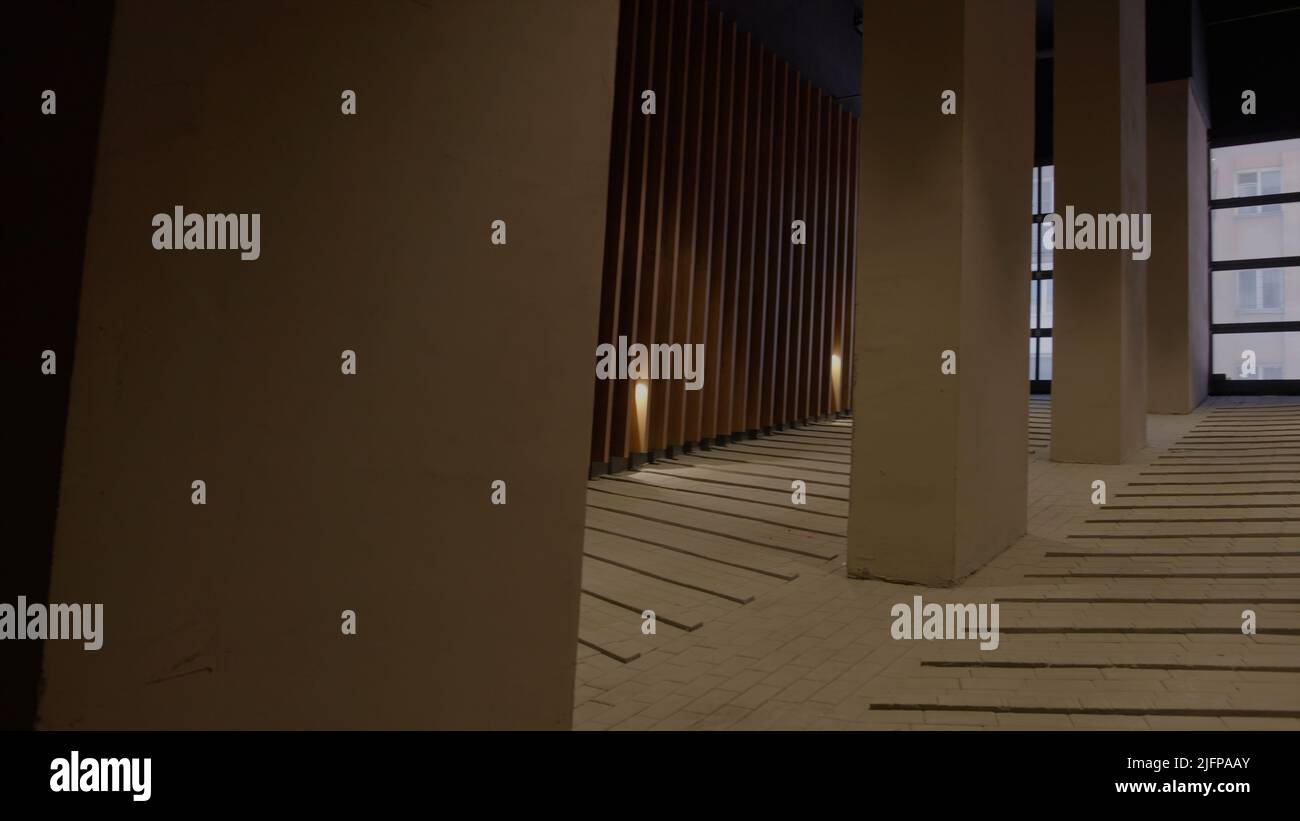 A bright corridor.Stock footage.Large columns and windows in the office ...