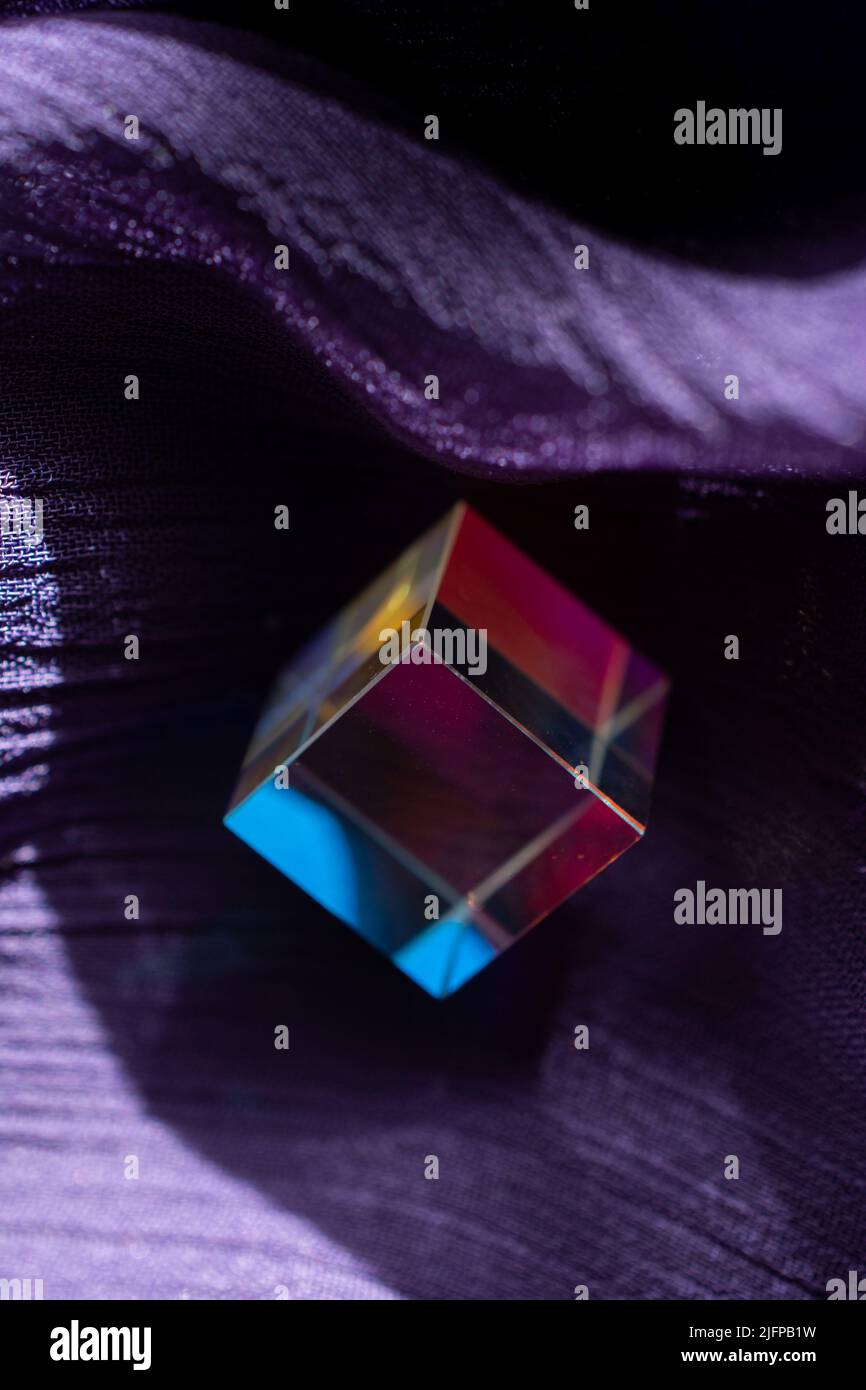 Luminous prism cubes refract light in different colors Stock Photo - Alamy