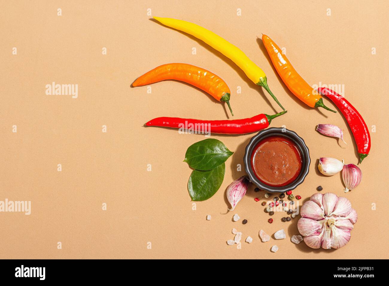 Cooking ingredients background. Ketchup, spices, vegetables, garlic ...