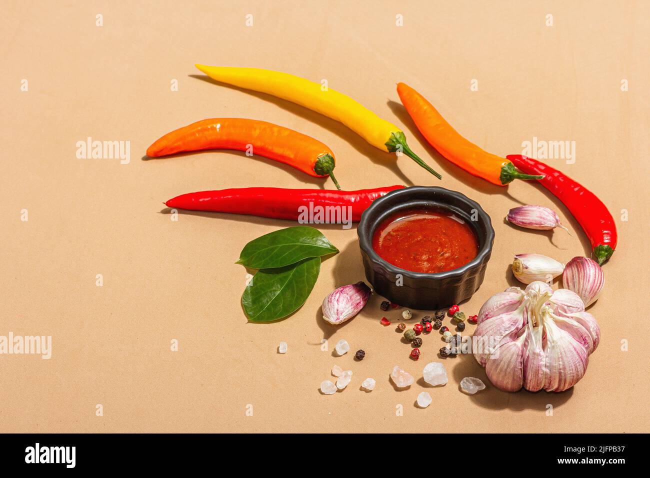Cooking ingredients background. Ketchup, spices, vegetables, garlic ...