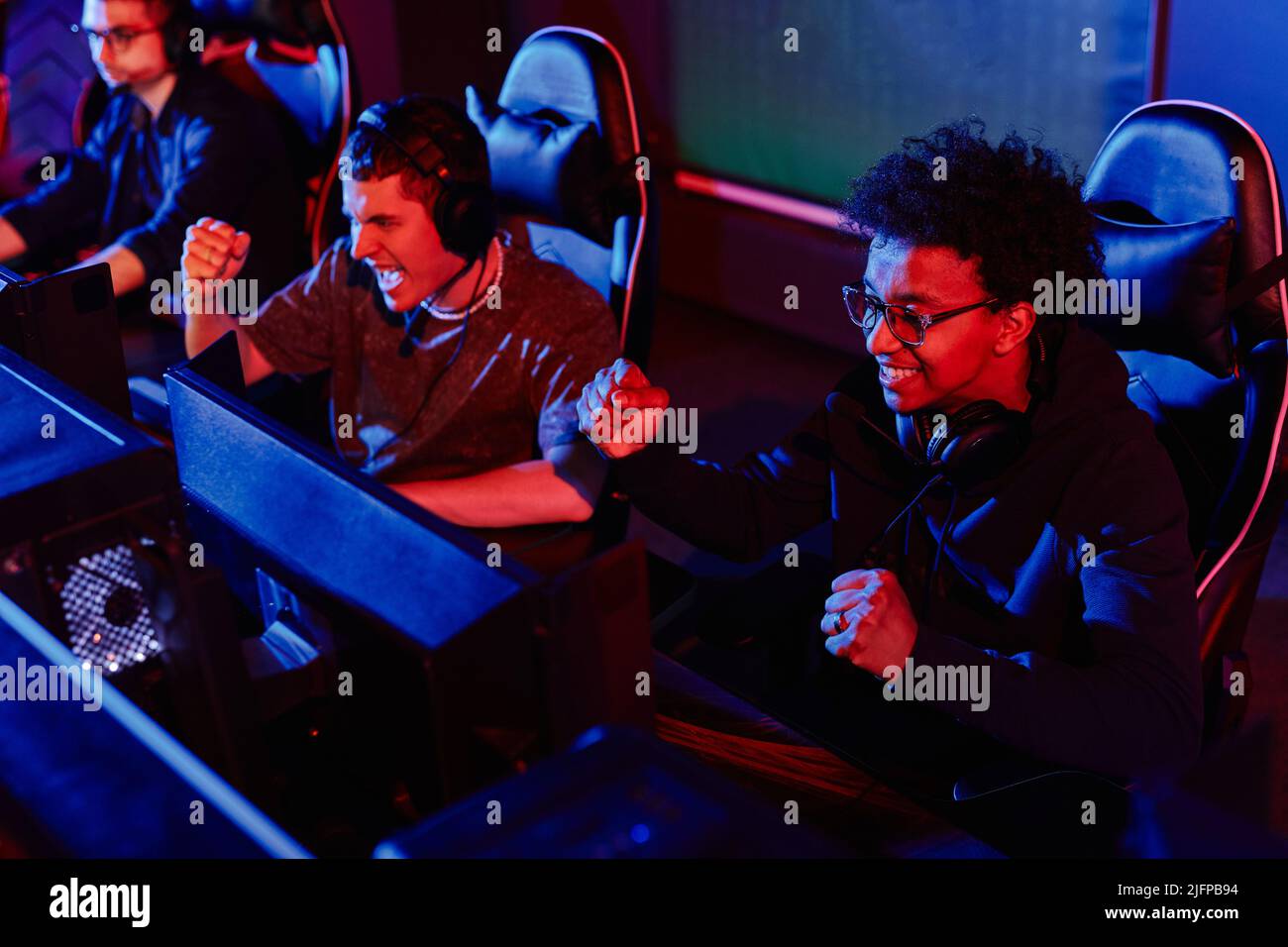Video game tournament diverse team hi-res stock photography and images ...