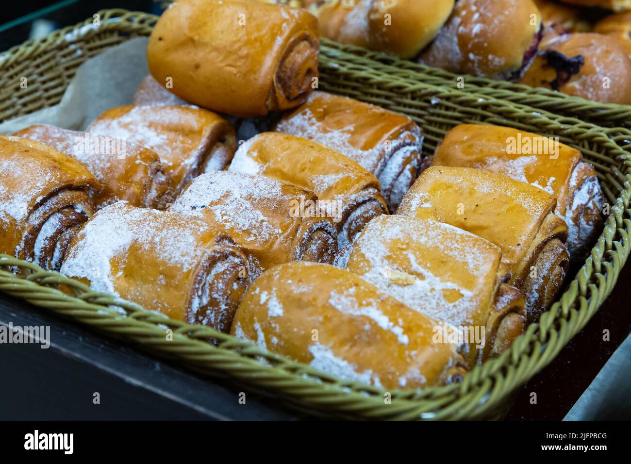 Fresh bake cinnamon roll with custard on a store counter Stock Photo ...