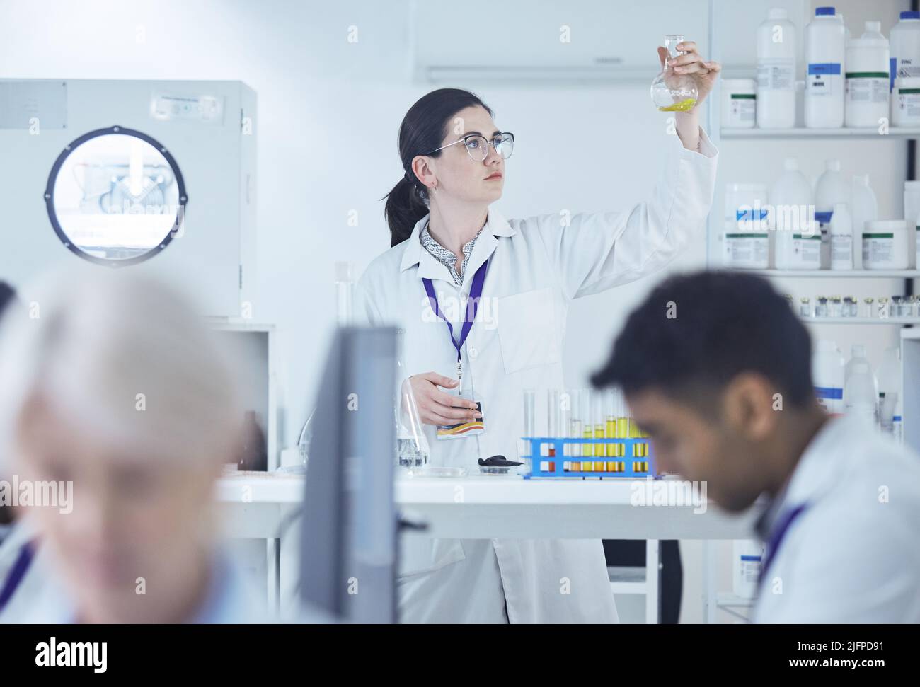 Serious scientists working in hi-res stock photography and images - Alamy