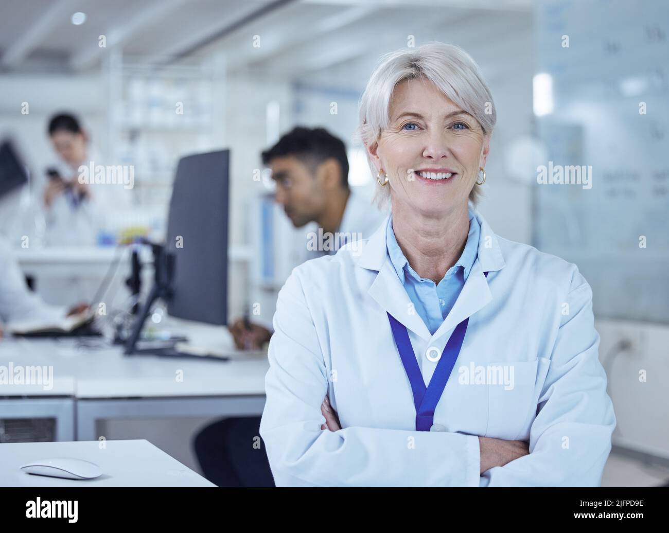 She dominates her field. Shot of a proud mature female scientist in the ...