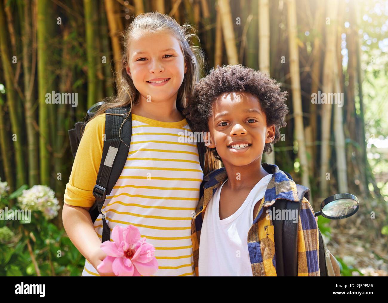 The more we play, the brighter the day. Shot of two young friends ...