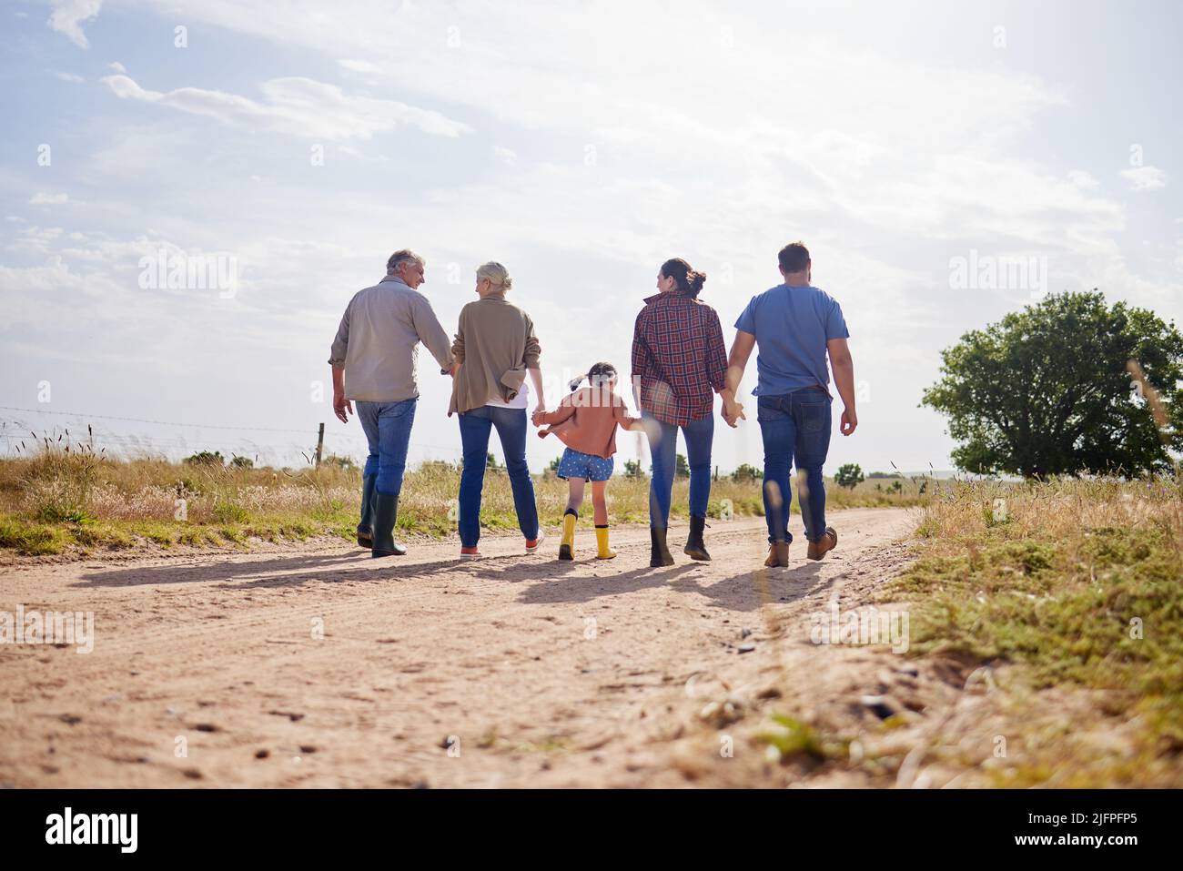Living a simple, rural life. Shot of a multi-generational family ...