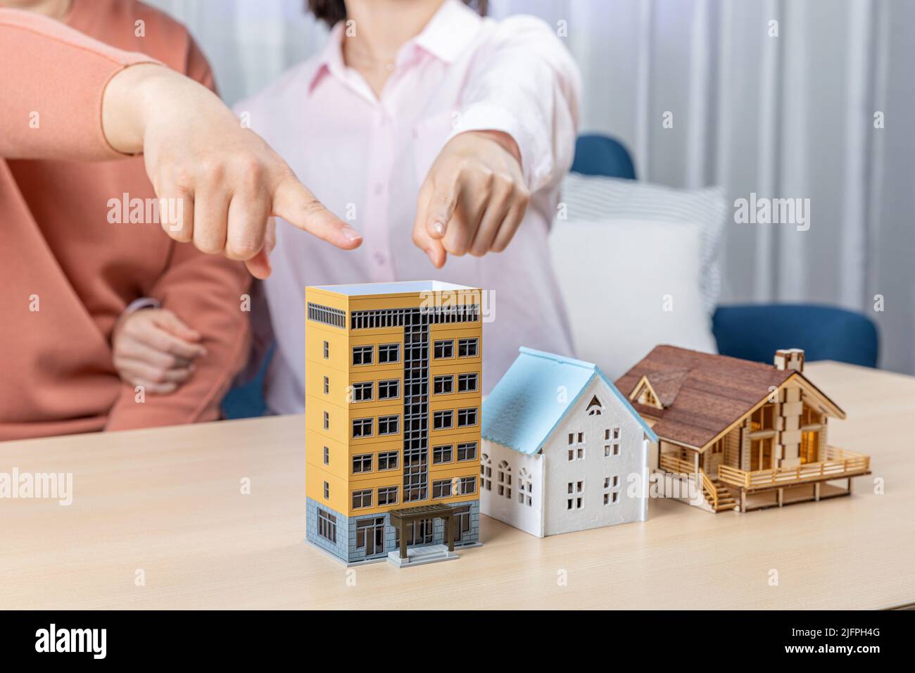 real estate contract hand motion newlywed couple choosing a house Stock ...