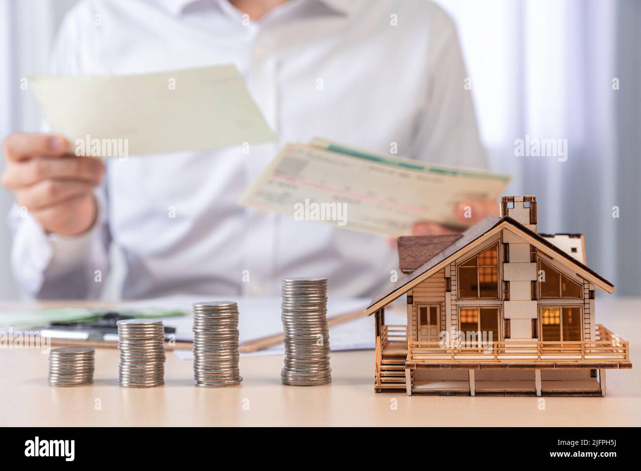 real estate contract hand motion check the utility bills Stock Photo ...