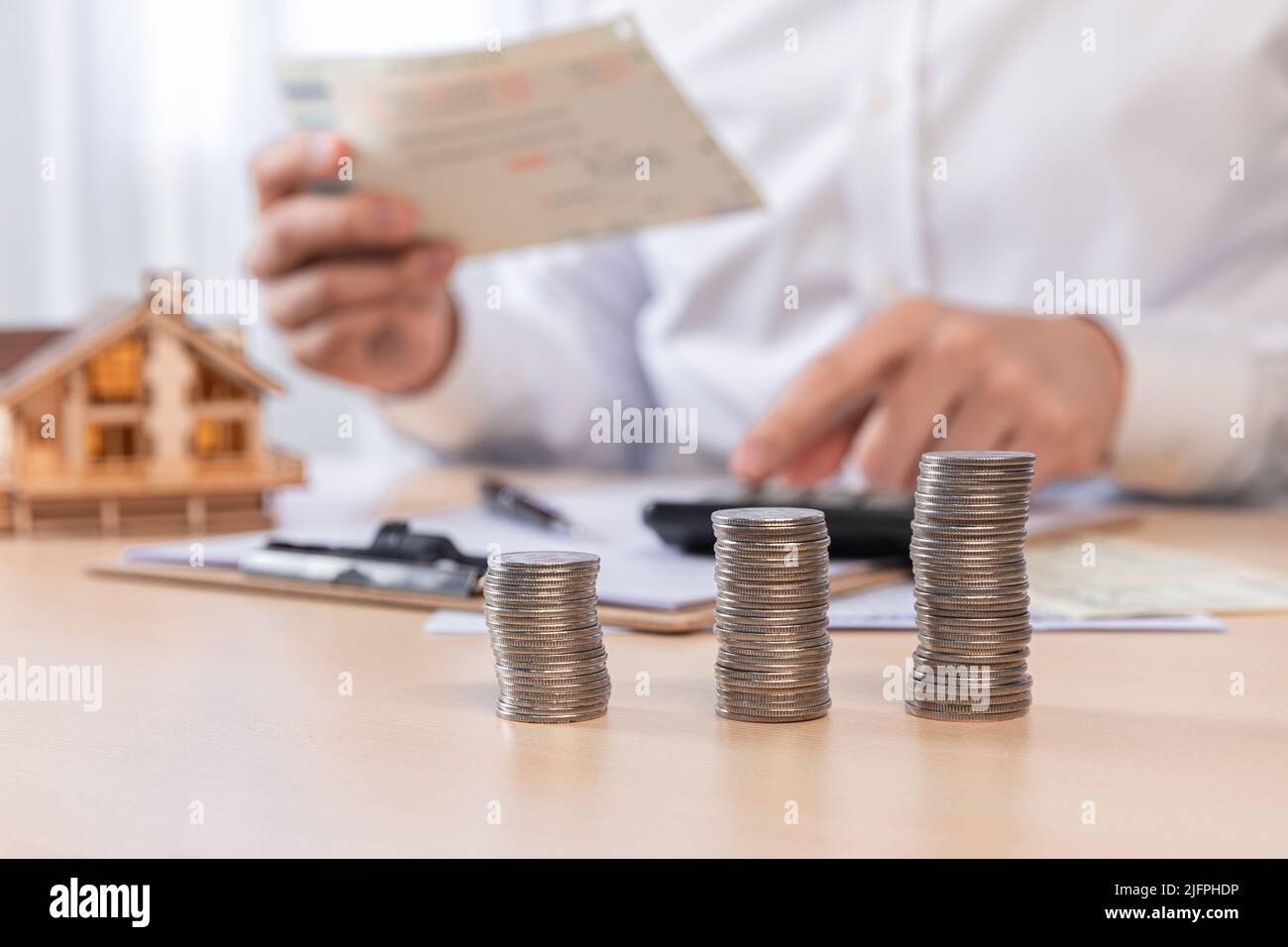 real estate contract hand motion calculating bills and costs Stock ...