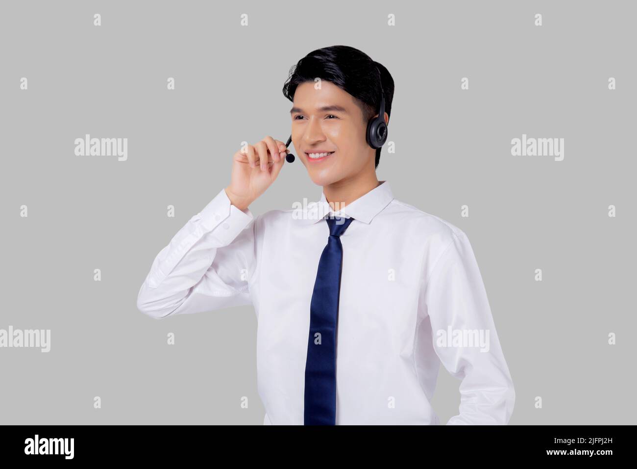 Portrait young asian business man call center wearing headset isolated ...