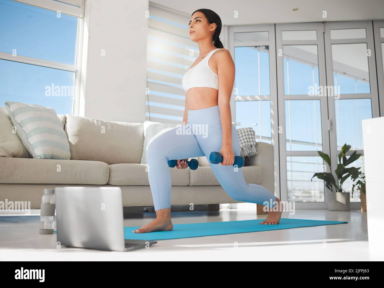 Woman lunges home hi-res stock photography and images - Alamy