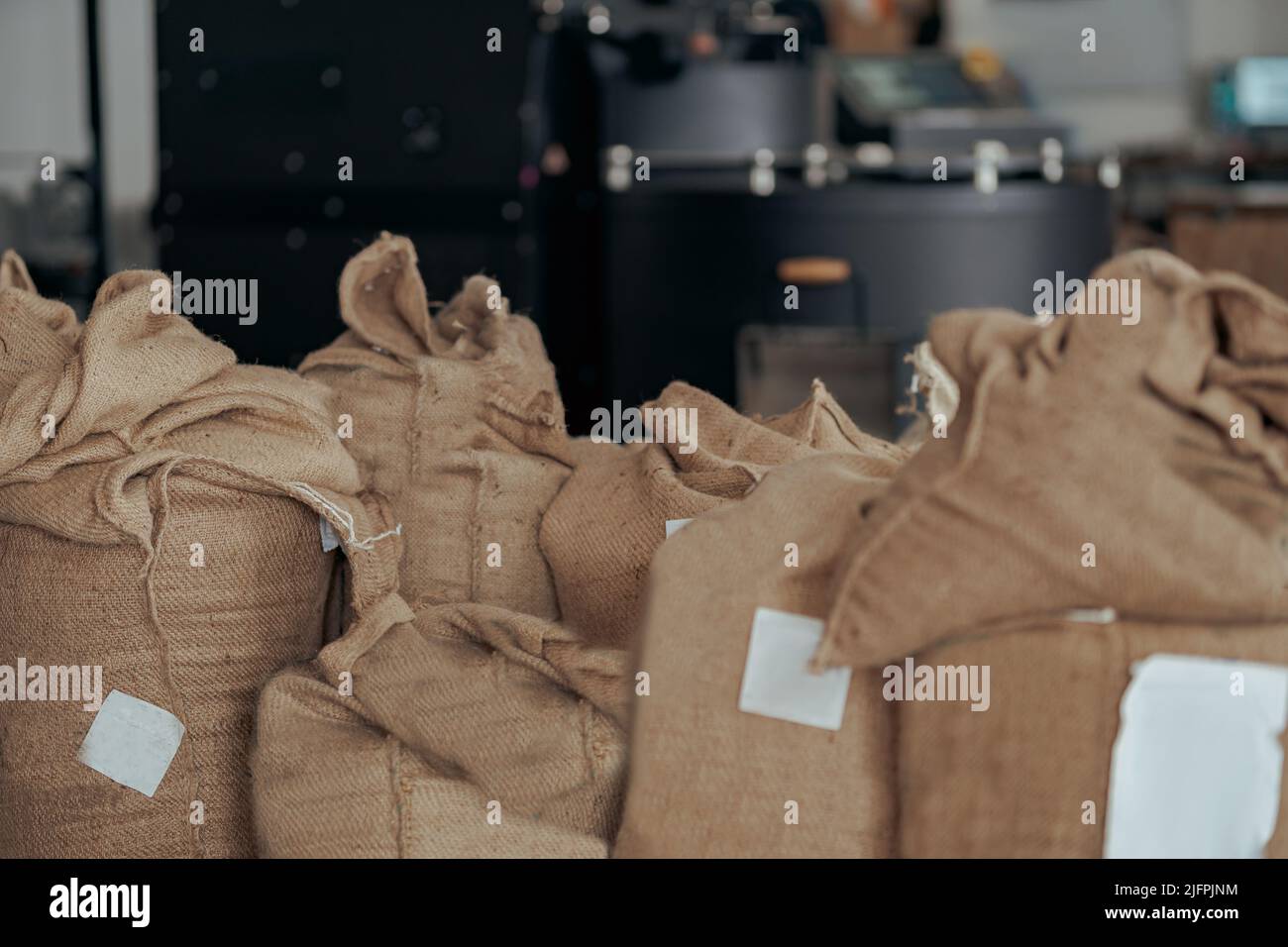 Sacks full of roasted coffee beans at the factory ready for sale Stock ...