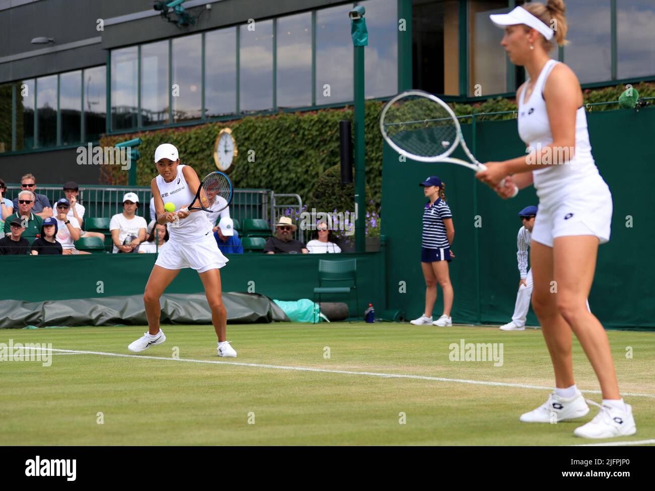 London, Britain. 4th July, 2022. Zhang Shuai (L) of China/Elise Mertens ...