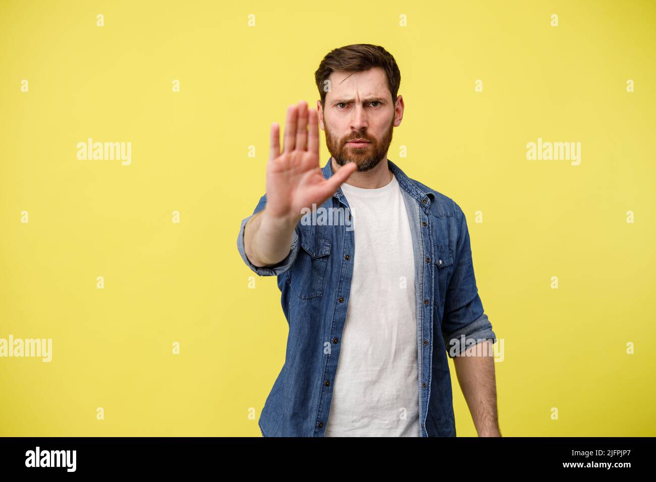Raised hand warning hi-res stock photography and images - Alamy