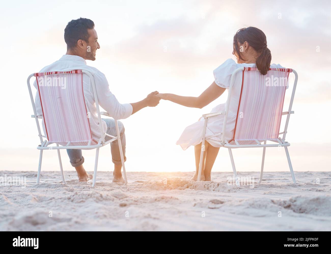 Chair holding hands rear view hi-res stock photography and images - Alamy