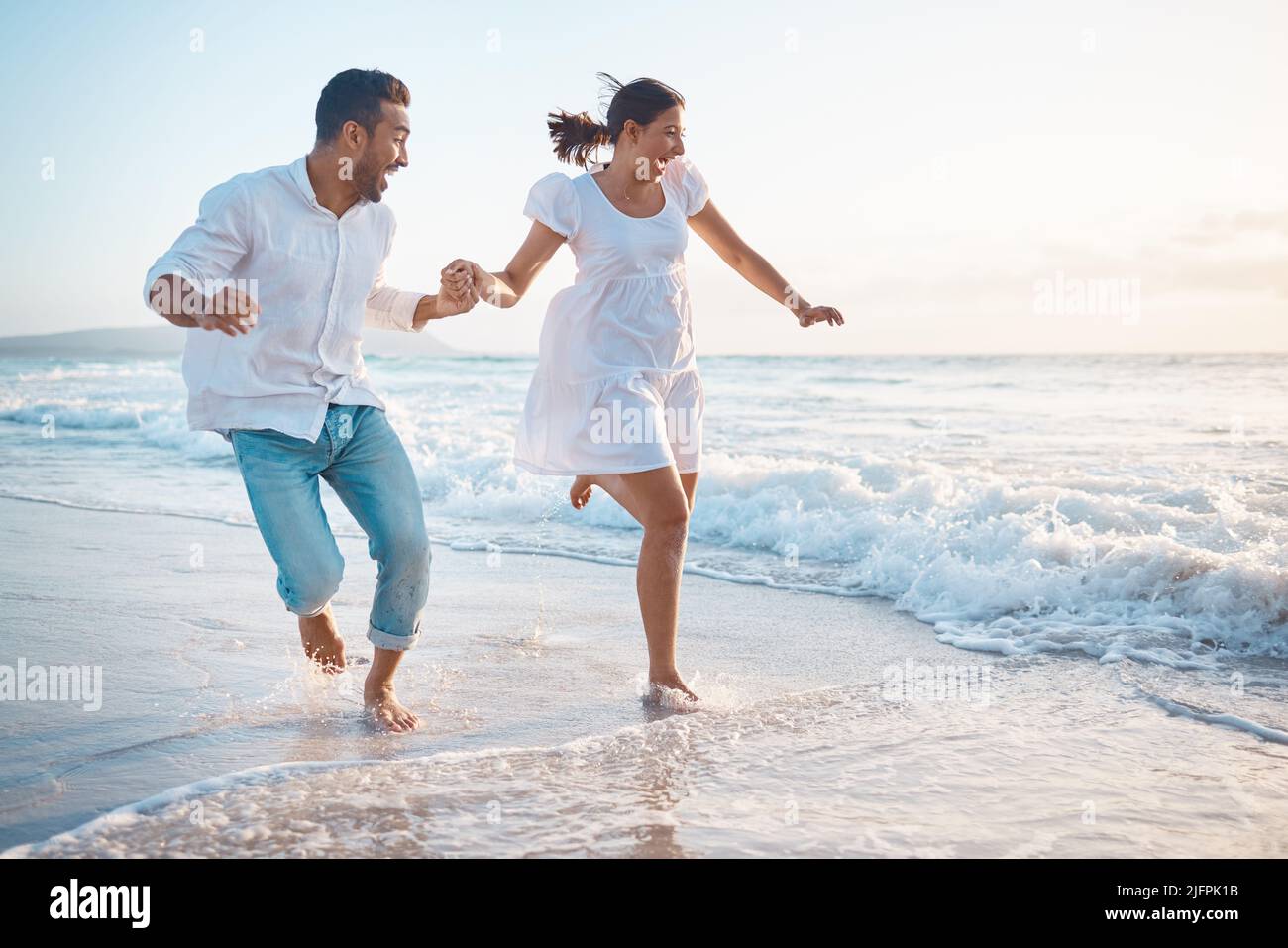 Man running from wave hi-res stock photography and images - Alamy