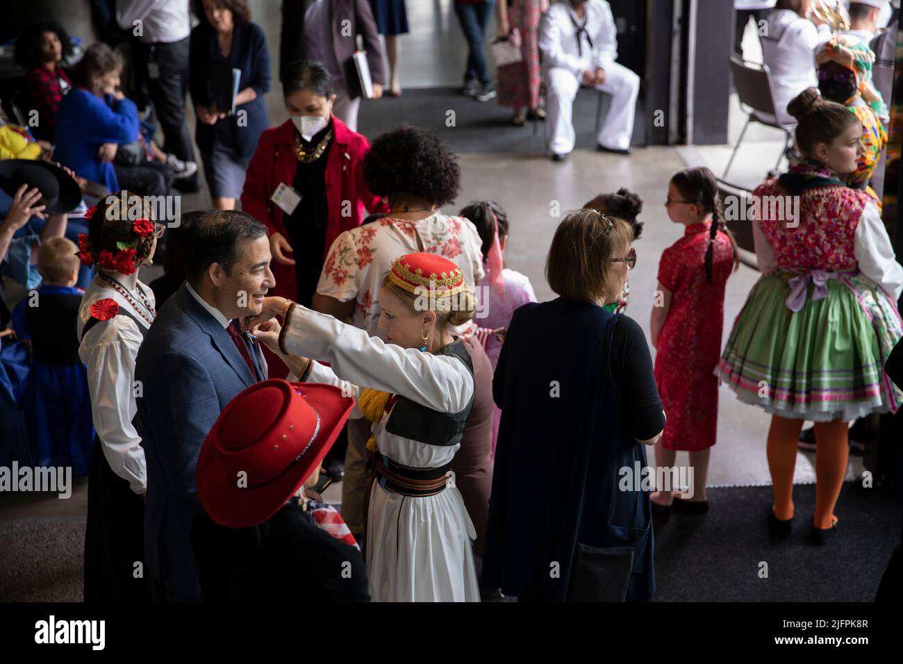 Immigration costume hi-res stock photography and images - Alamy