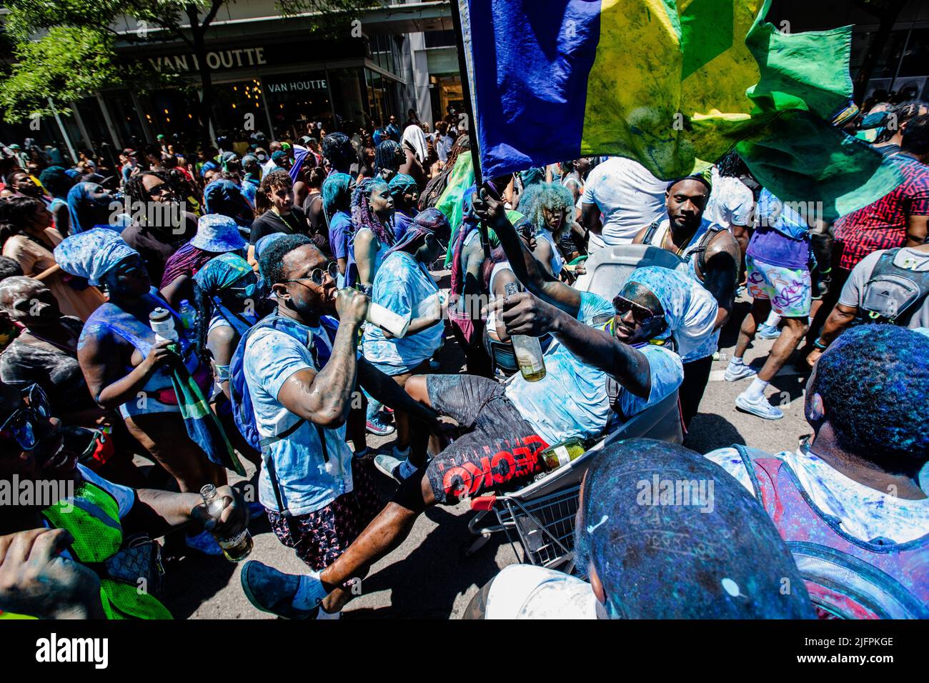 The crowd of revelers following the Carifiesta parade. Since 1975 the ...