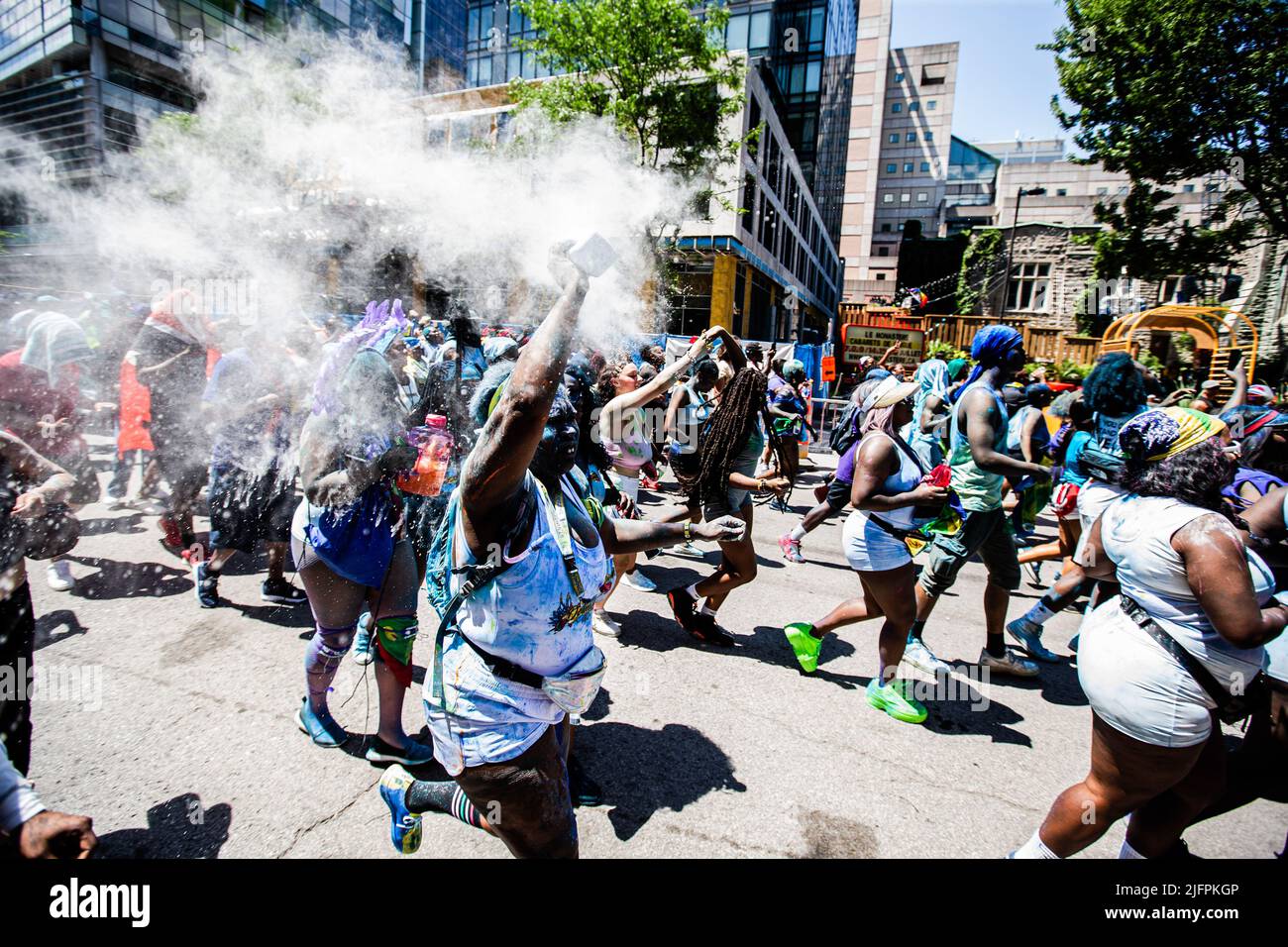 The crowd of revelers following the Carifiesta parade. Since 1975 the ...
