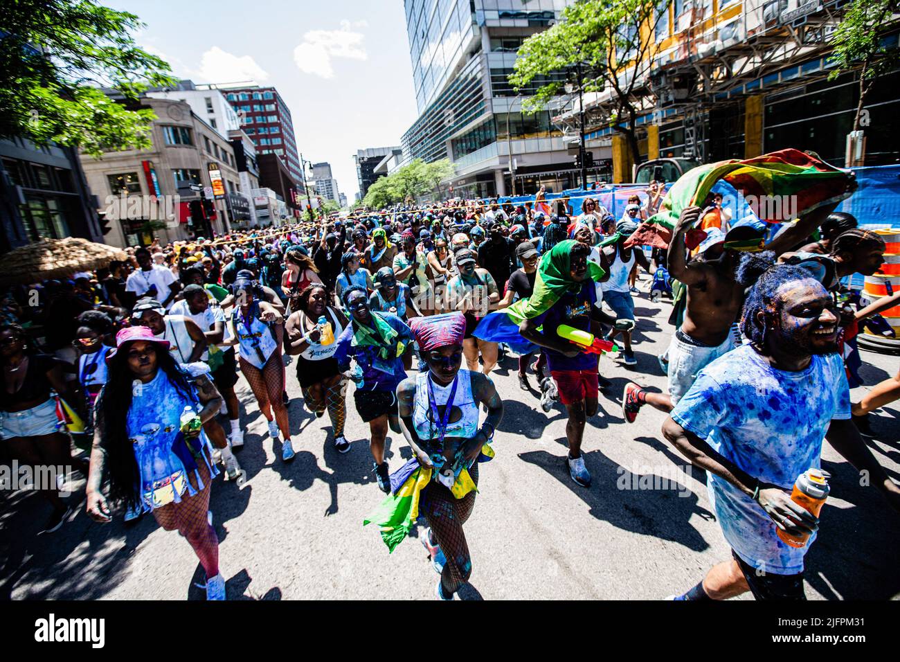 Montreal, Canada. 2nd July, 2022. The crowd of revelers following the ...