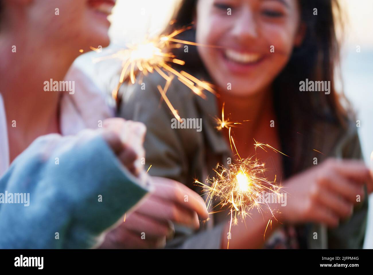 Celebrate the magical moments of life. Shot of a group of friends ...