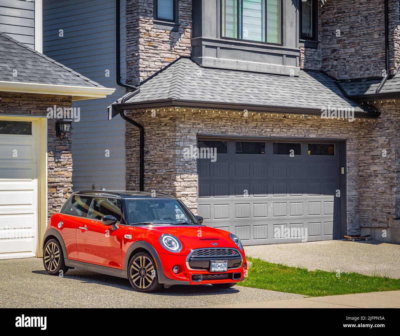 Bright Red Color Car Mini Cooper Parked On Street In a Town. Motor car ...