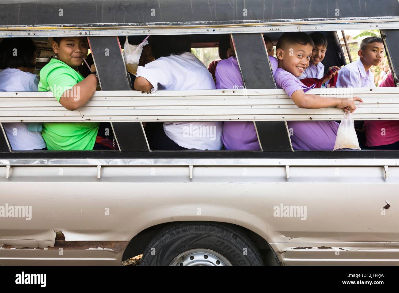 Students in local school bus, go home from school, Ayutthaya, Thailand ...