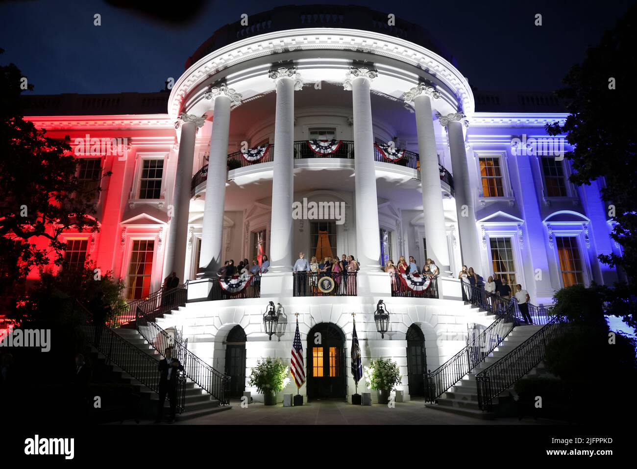 President Joe Biden and first lady Jill Biden and family members watch ...