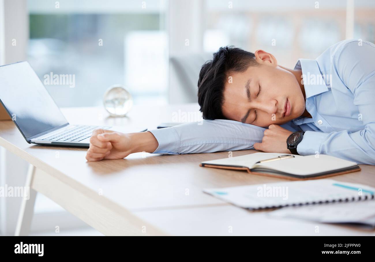 Asian man sleeping at desk hi-res stock photography and images - Alamy