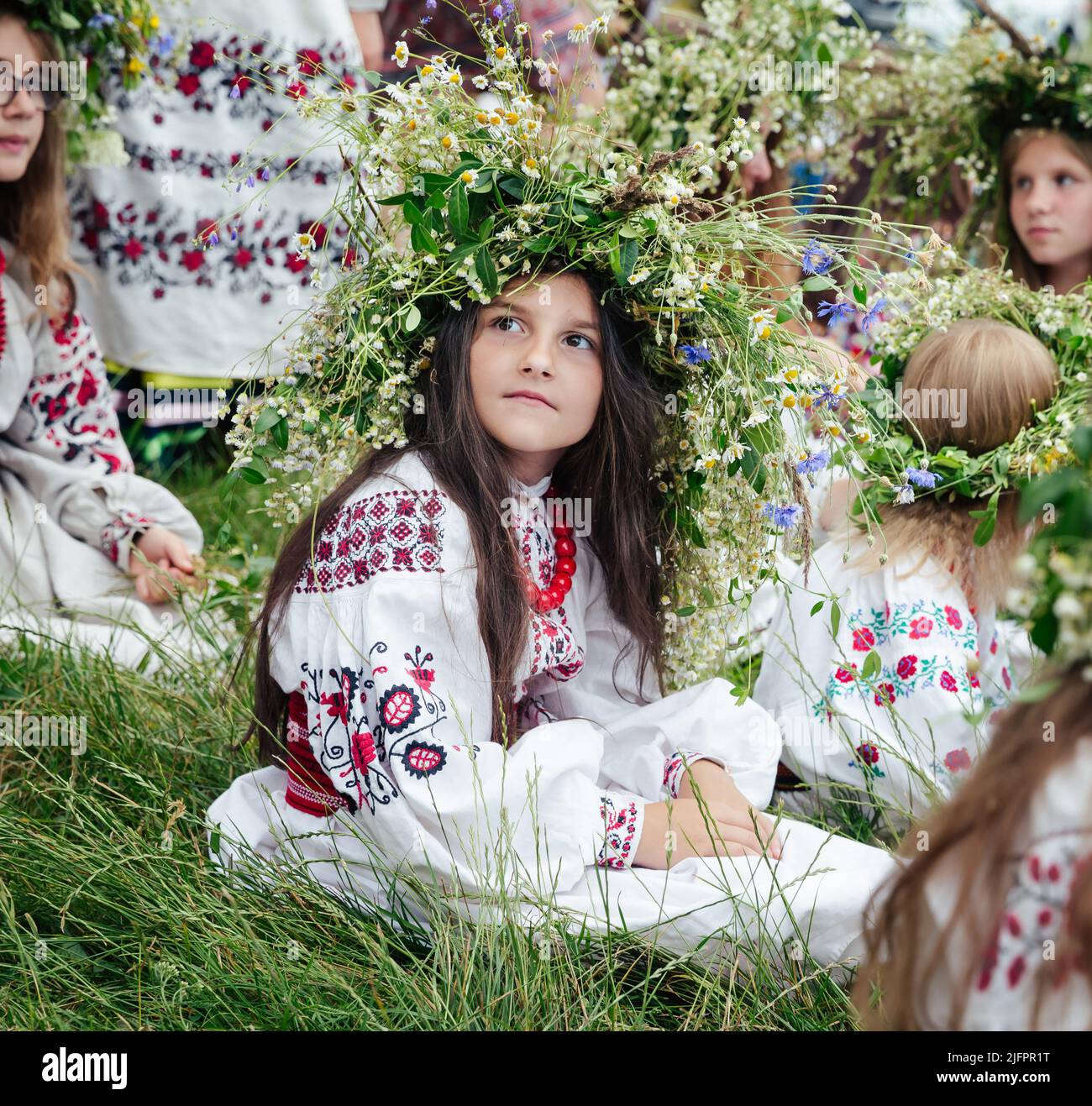 Teenage girls in Ukrainian national clothes and traditional flower ...