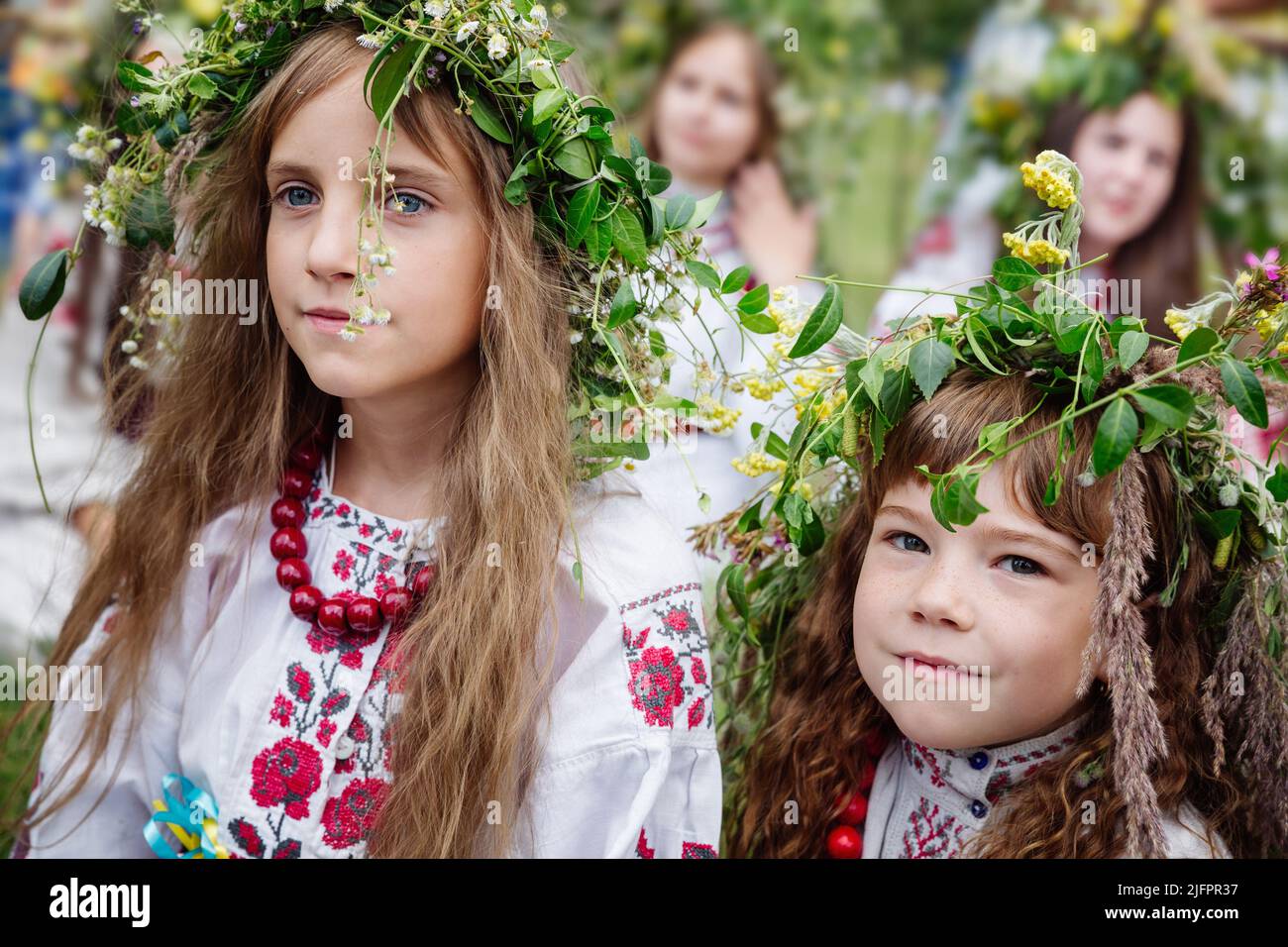 Teenage girls in Ukrainian national clothes and traditional flower ...
