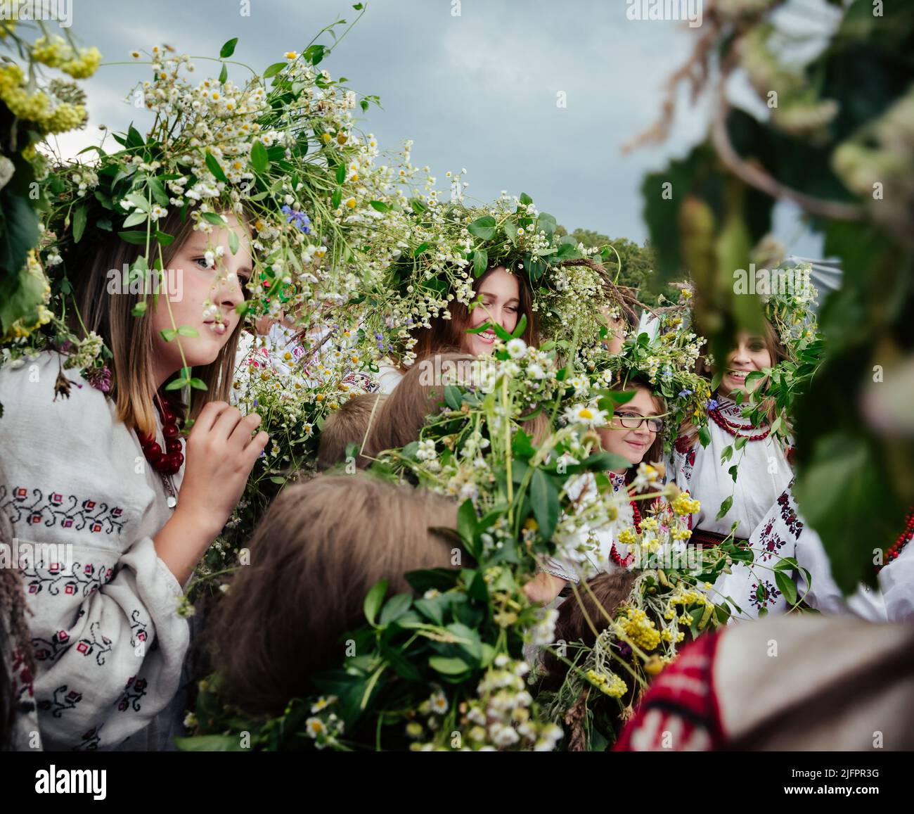 Teenage girls in Ukrainian national clothes and traditional flower ...